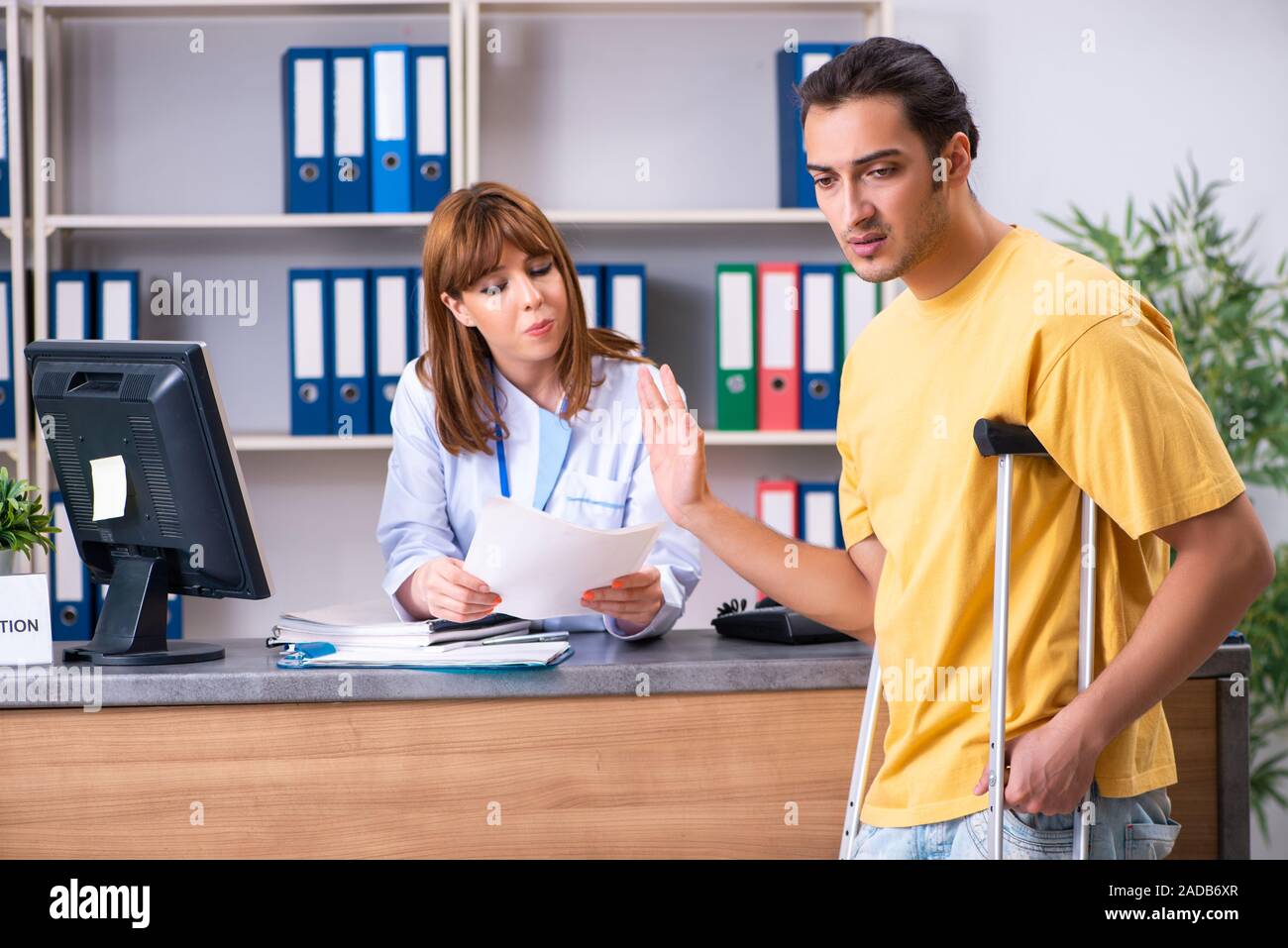 Young patient at the reception in the hospital Stock Photo - Alamy