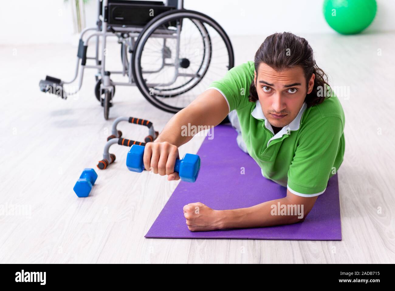 Wheelchair man lifting weight in hi-res stock photography and images ...