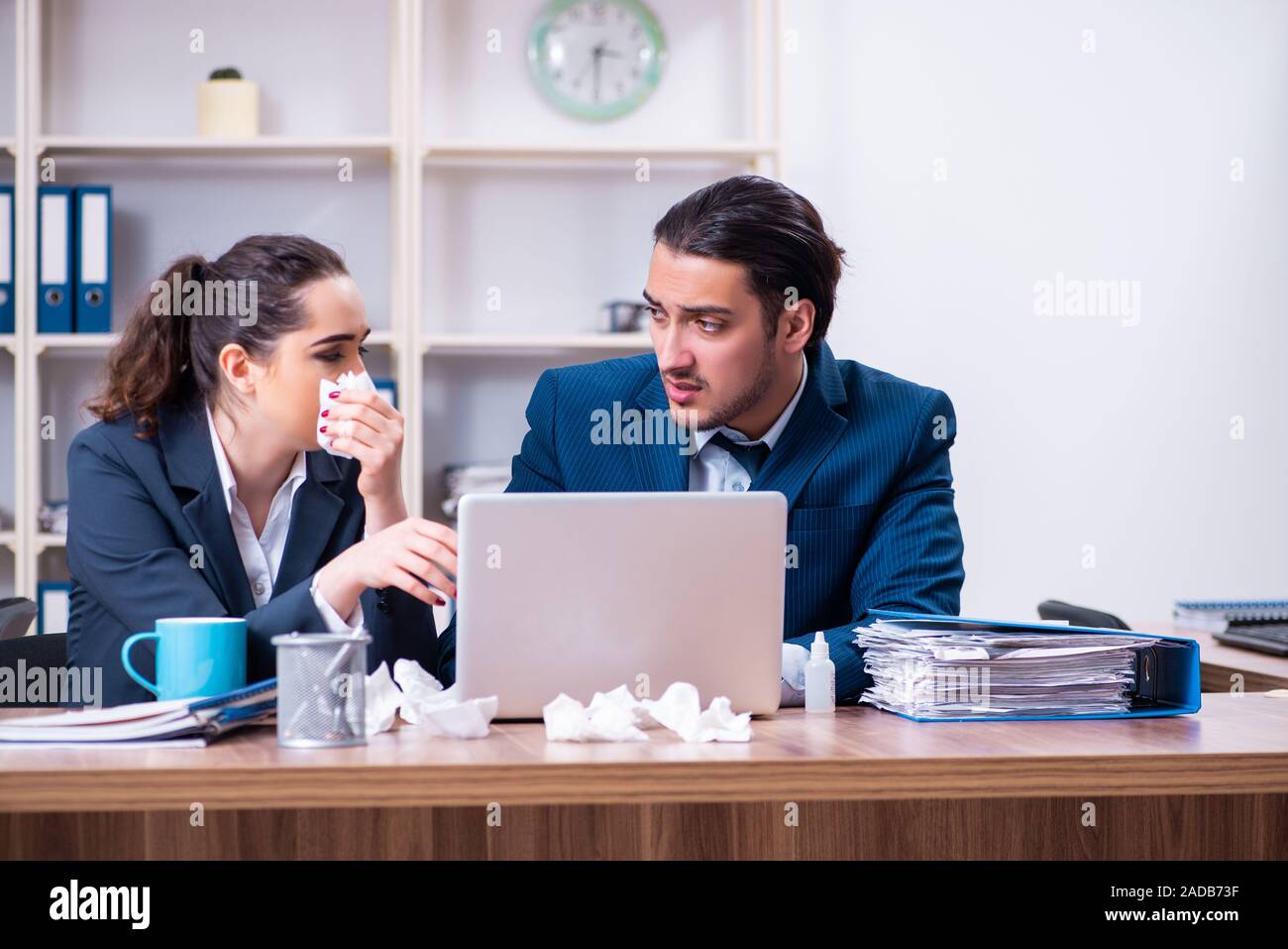 Two employees sick hi-res stock photography and images - Alamy