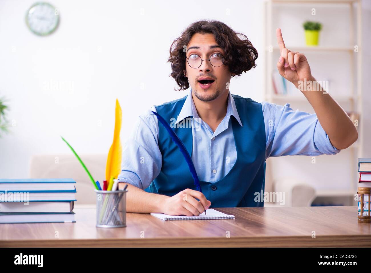 Young writer working on his new work Stock Photo - Alamy