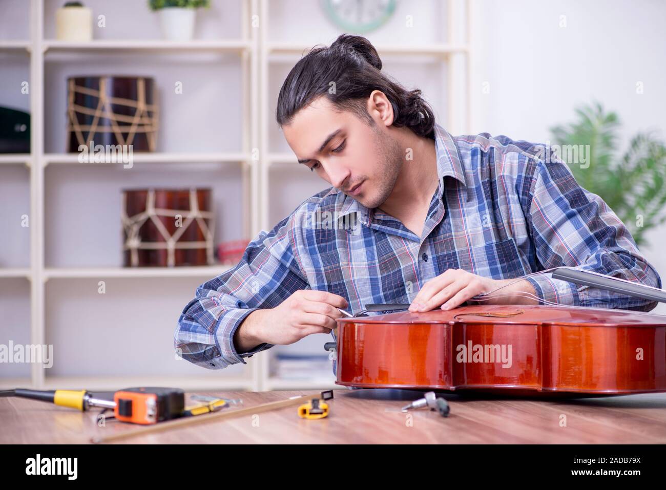 Cello repair hi-res stock photography and images - Alamy