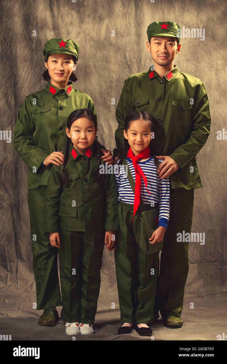 Happy family military uniform Stock Photo - Alamy