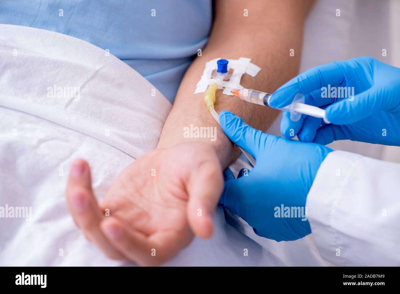 Male patient in blood transfusion concept hi-res stock photography and ...