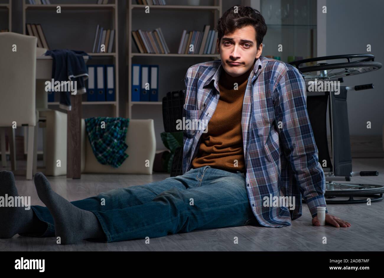 Falling off chair hi-res stock photography and images - Alamy