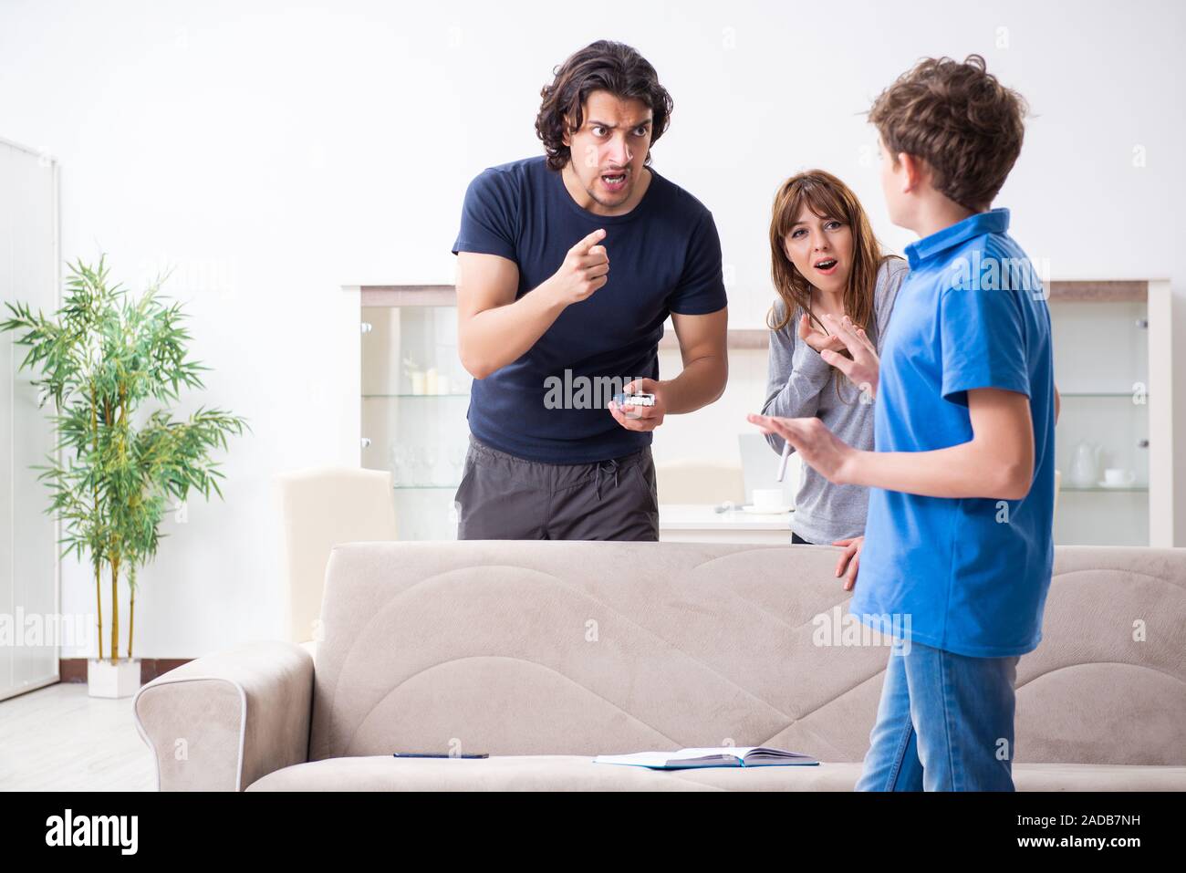 Concept of underage smoking with young boy and family Stock Photo - Alamy