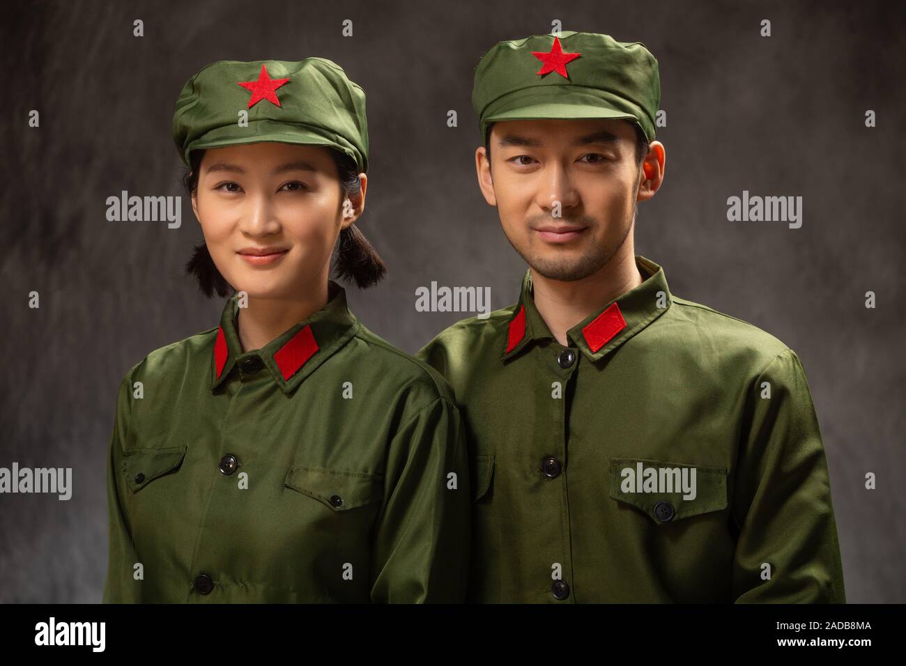 Young couple photo in uniform Stock Photo - Alamy