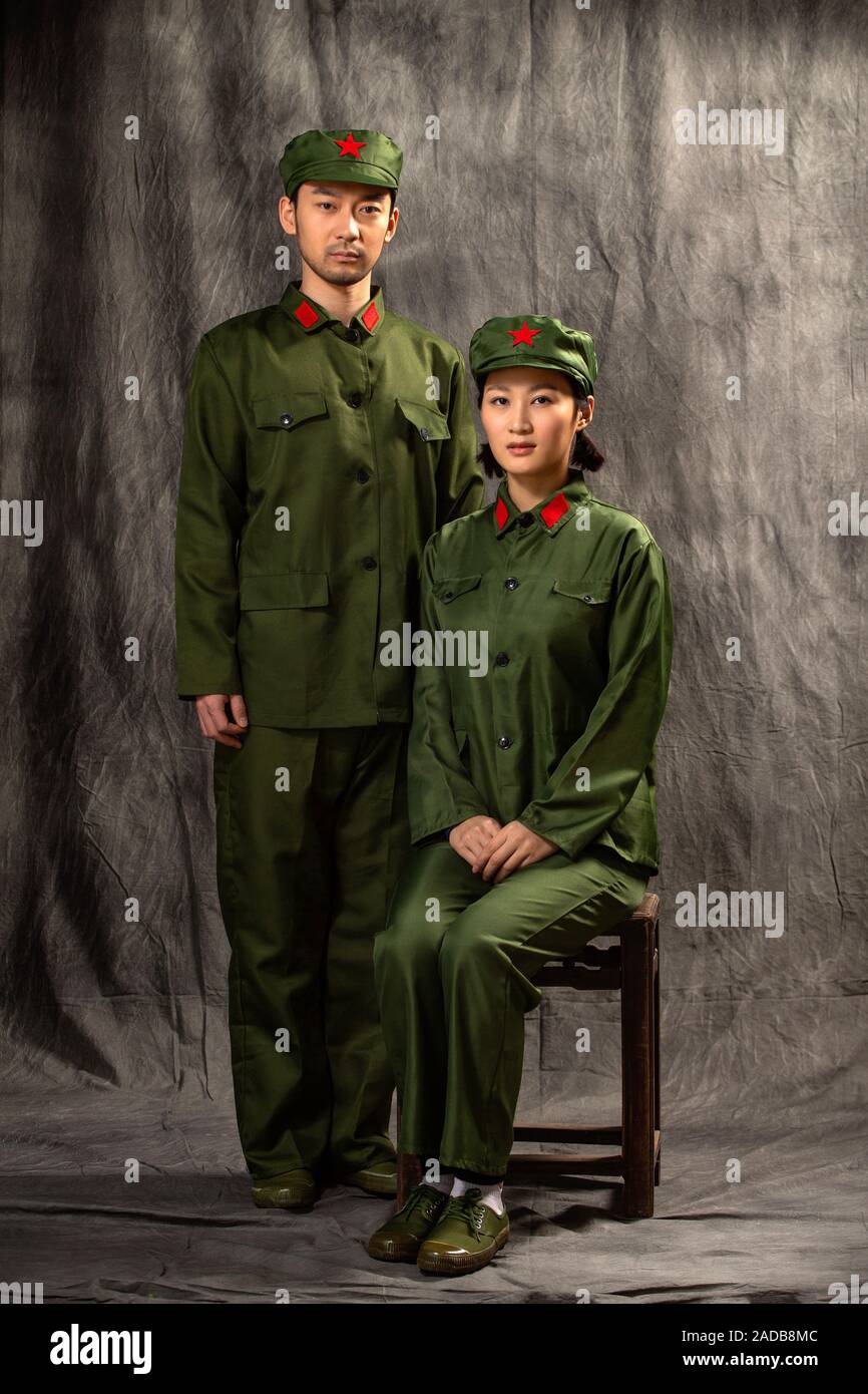 Young couple photo in uniform Stock Photo - Alamy