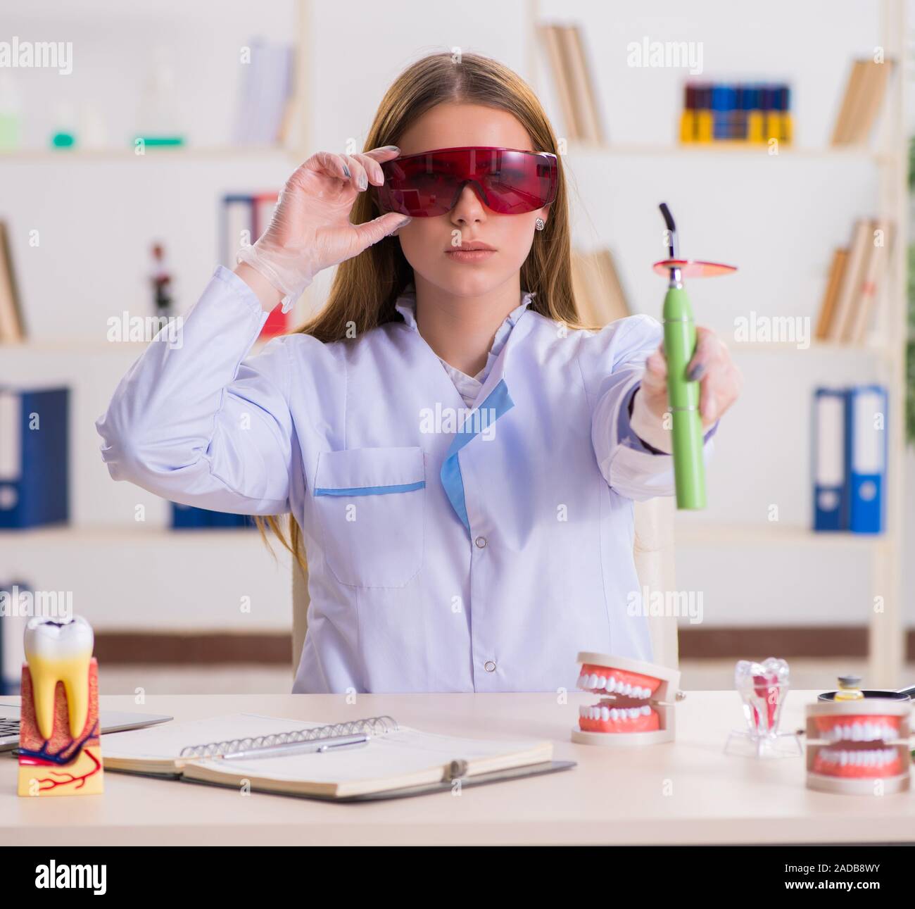 Dentistry student practicing skills in classroom Stock Photo - Alamy
