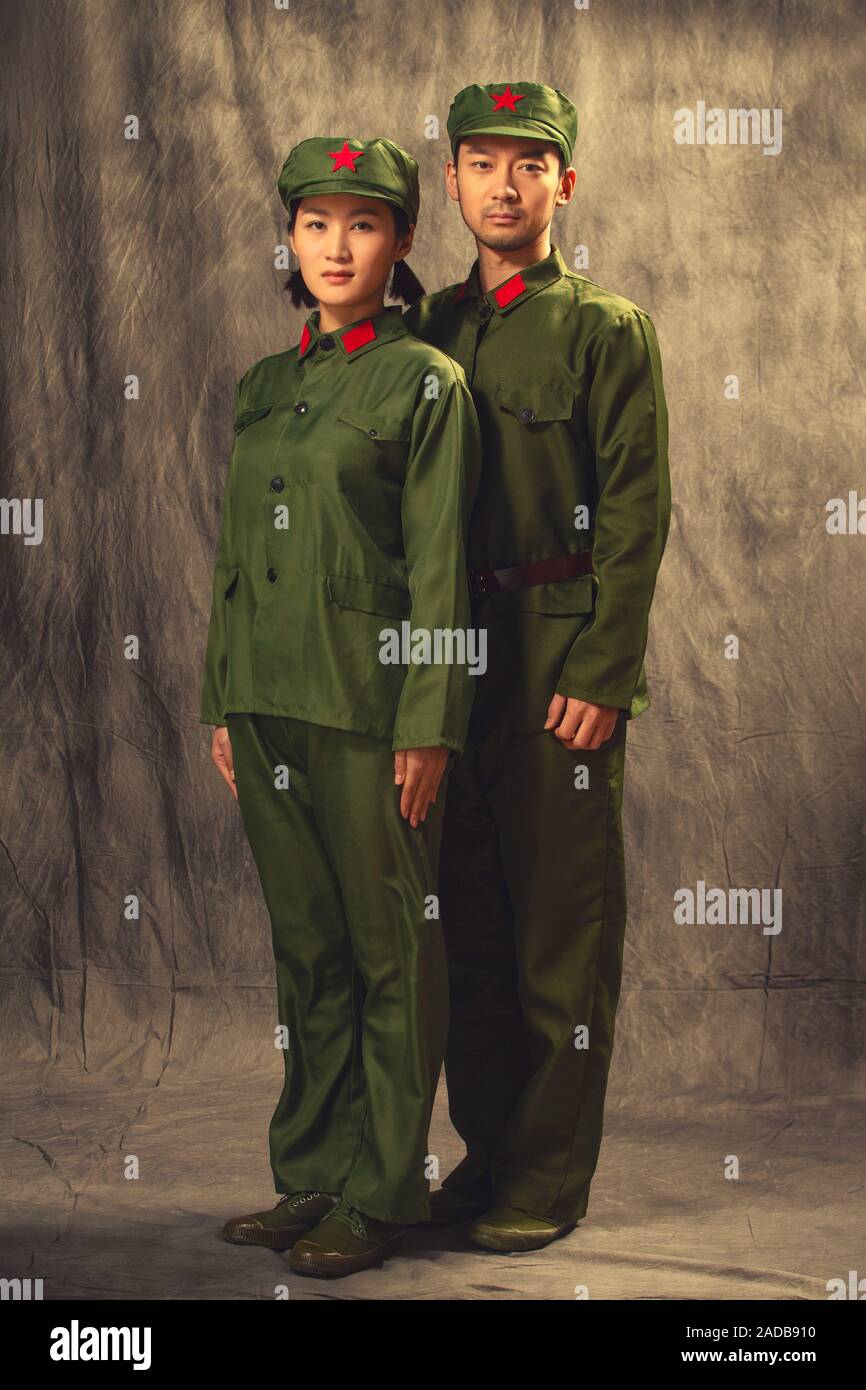 Young couple photo in uniform Stock Photo - Alamy