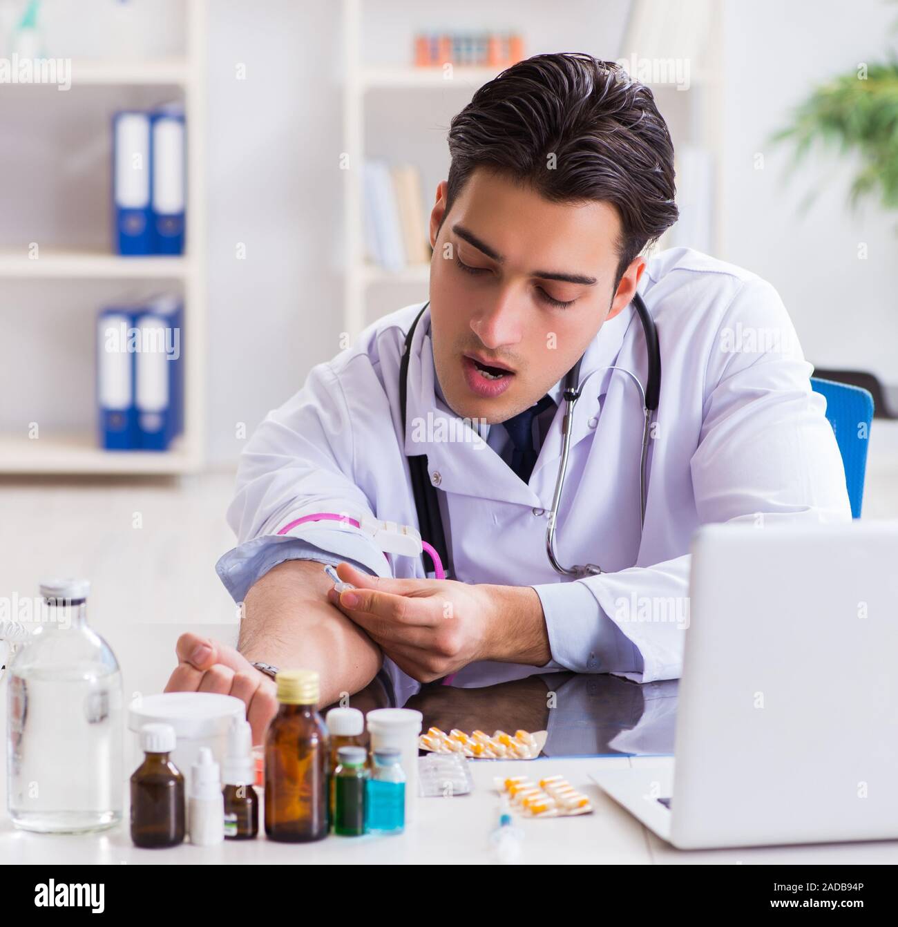 Doctor drug addict in the hospital Stock Photo - Alamy