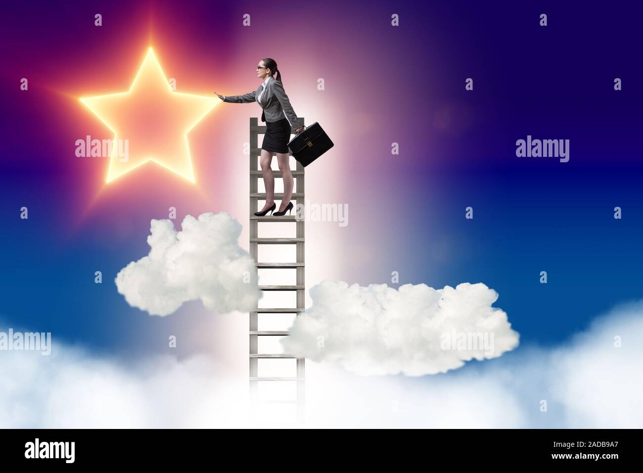 Businesswoman reaching out for stars in success concept Stock Photo - Alamy