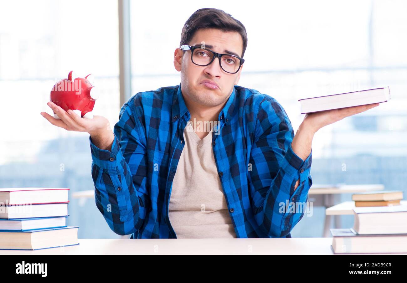 The concept of expensive textbooks and cost of education Stock Photo ...