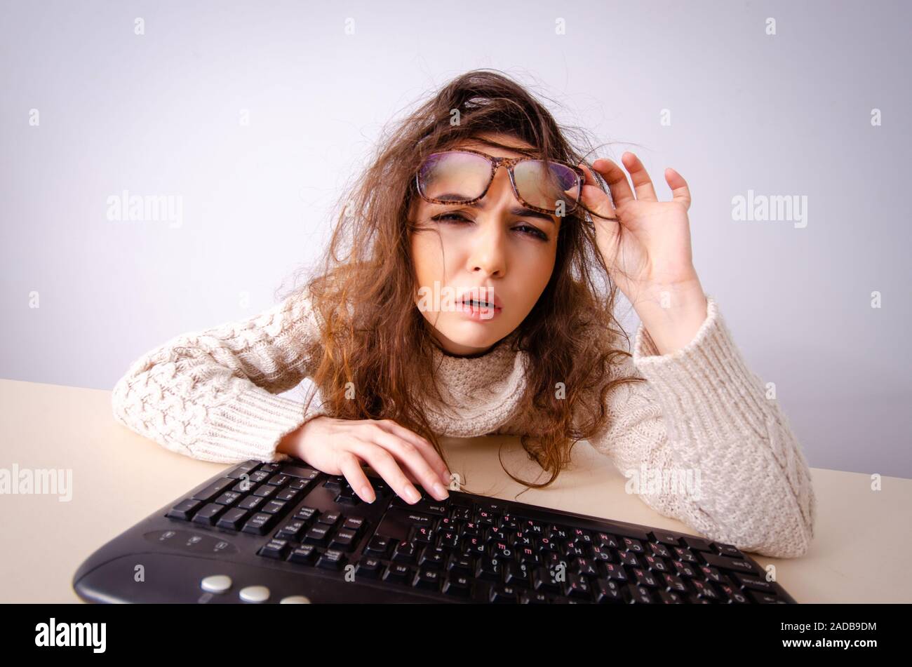 Funny nerd girl working on computer Stock Photo - Alamy