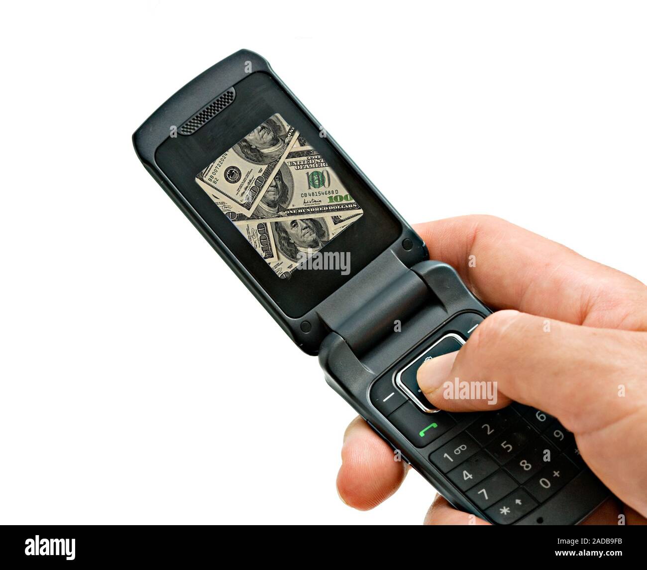 Mobile phone with banknotes on screen Stock Photo - Alamy