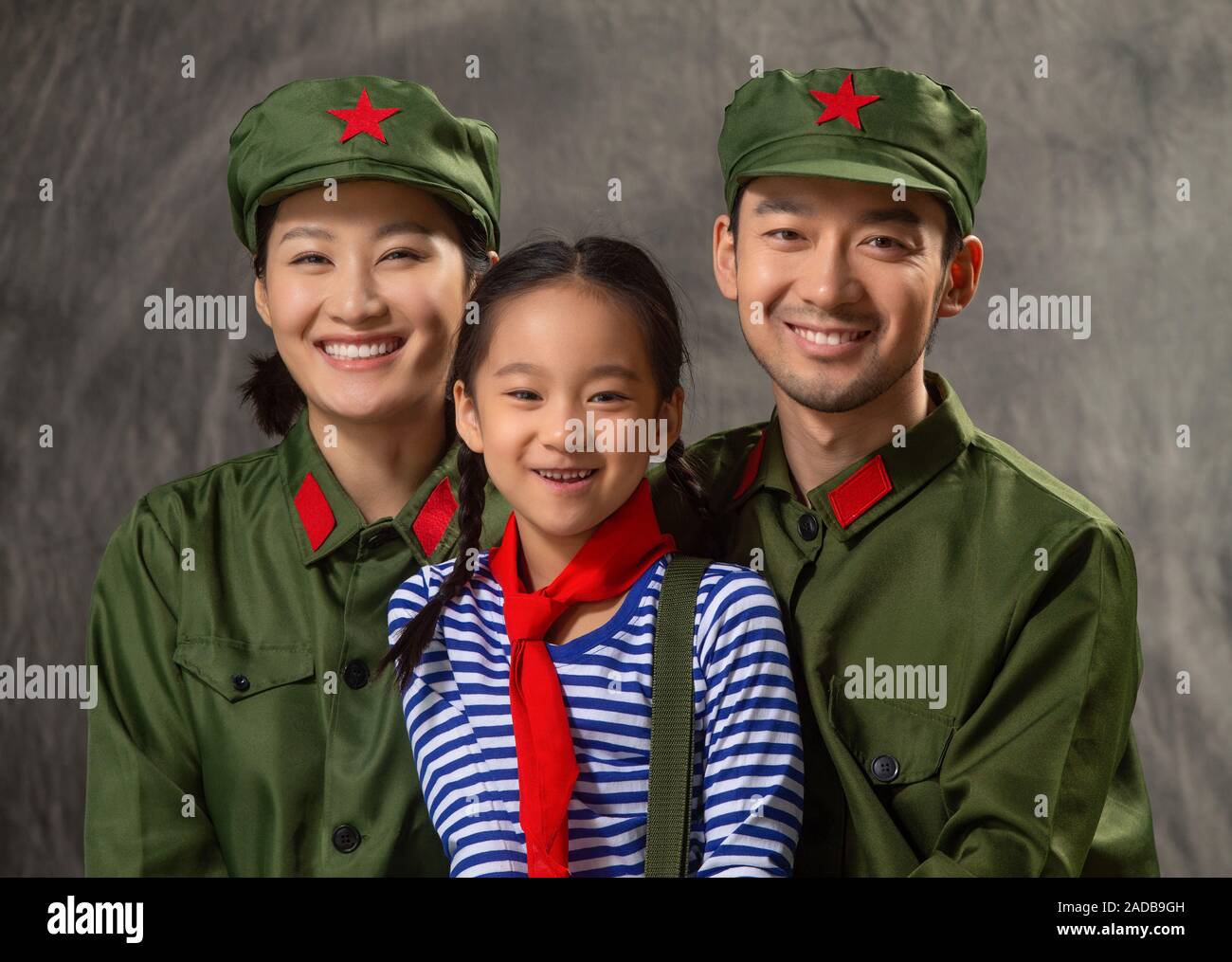 Happy family military uniform Stock Photo - Alamy