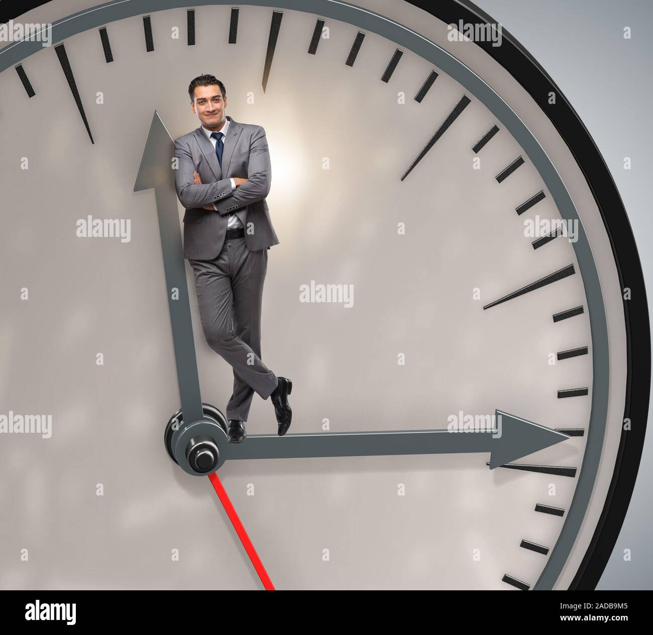 Businessman in time management concept Stock Photo - Alamy