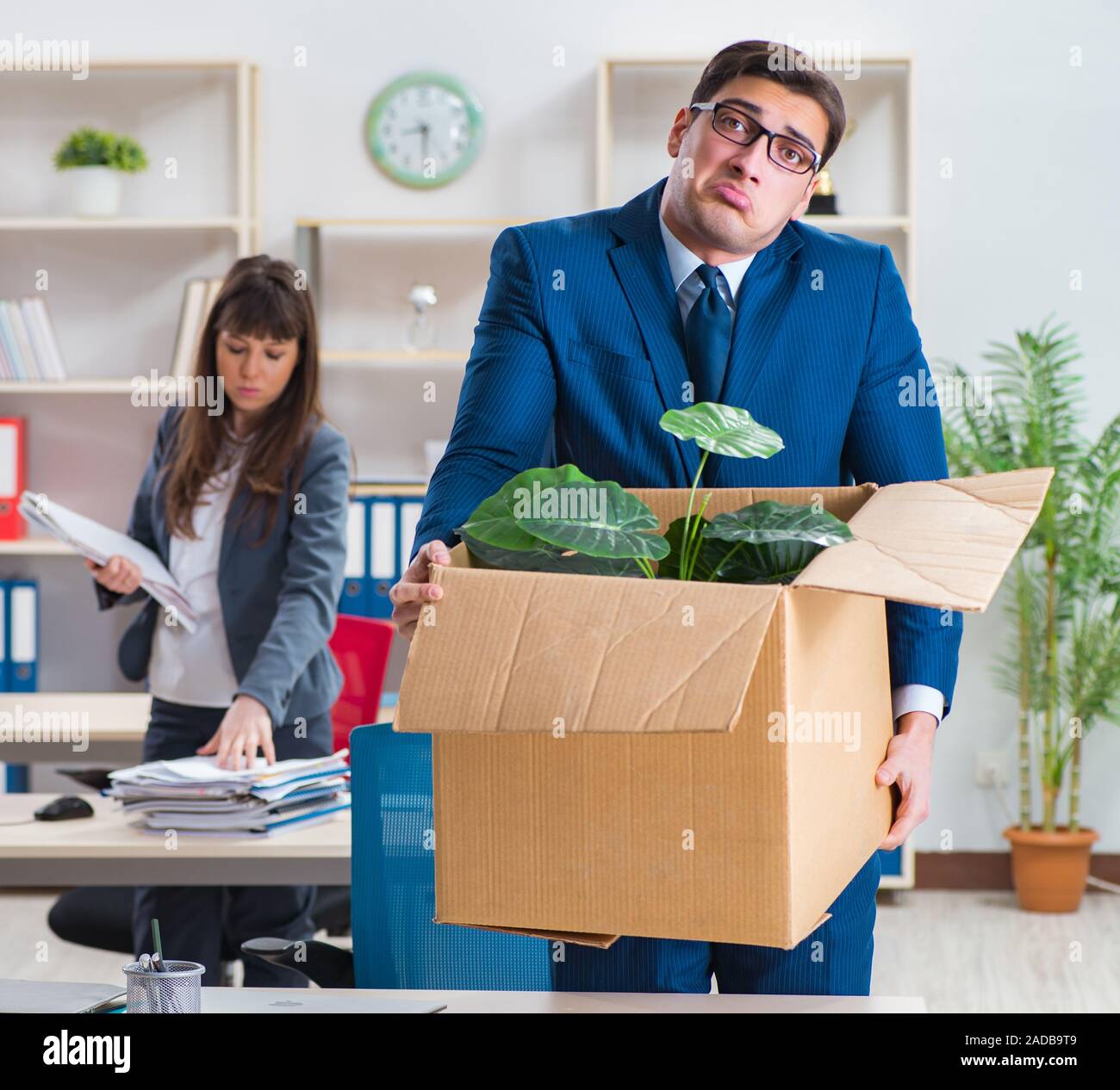 Person being fired from his work Stock Photo - Alamy