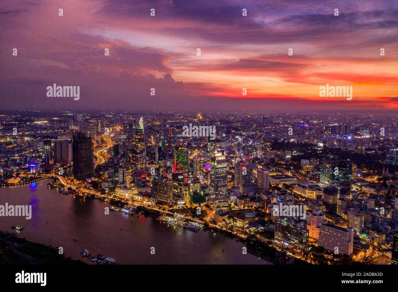 Saigon beautiful cityscape and lights with orange sunset skyline Stock ...