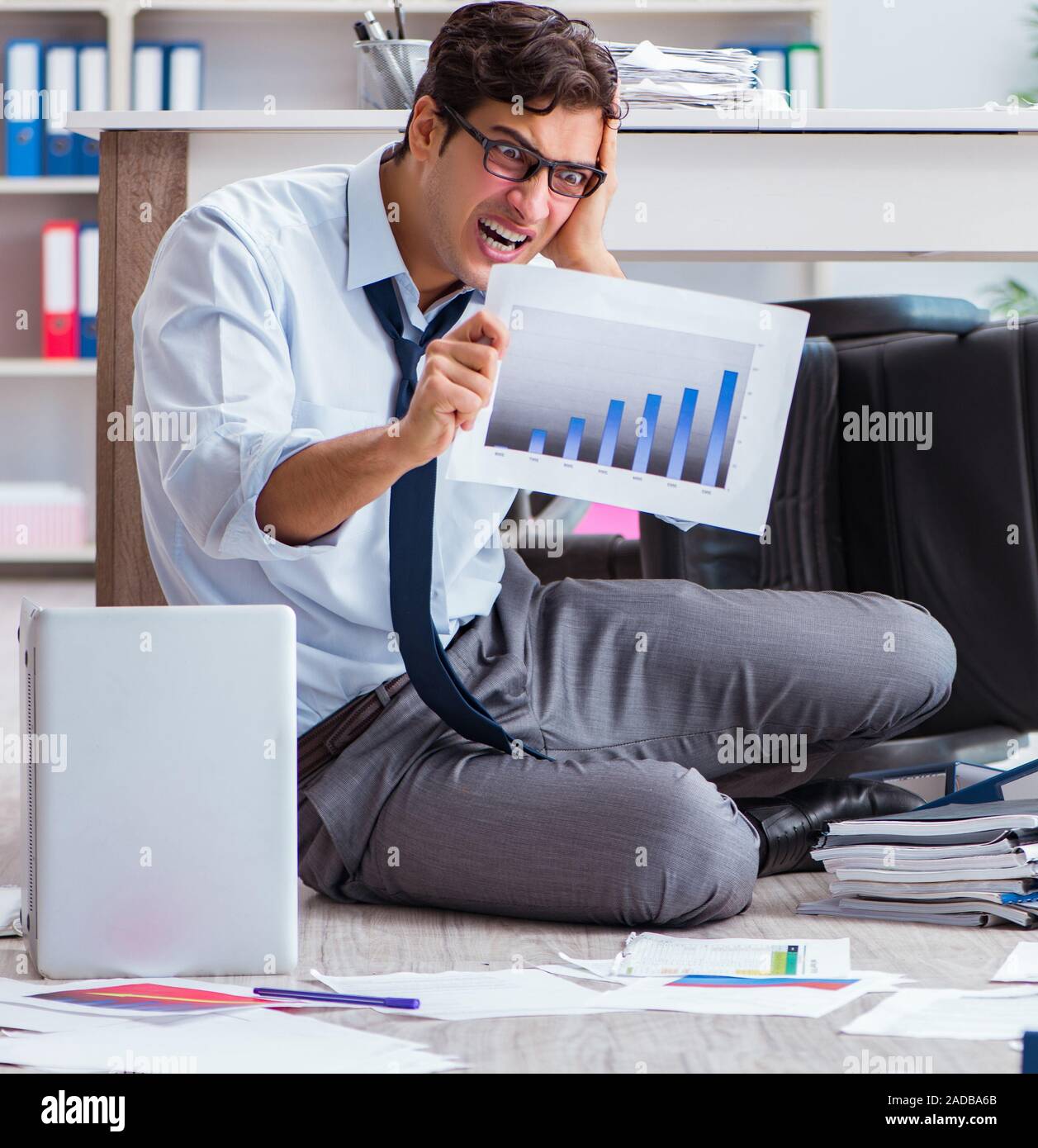 Bankrupt Businessman angry in the office floor Stock Photo - Alamy