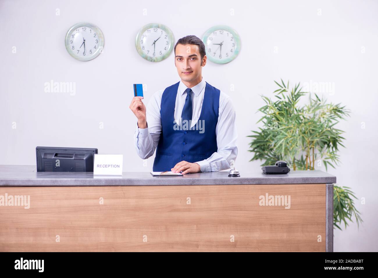 Receptionist showing hotel room hi-res stock photography and images - Alamy