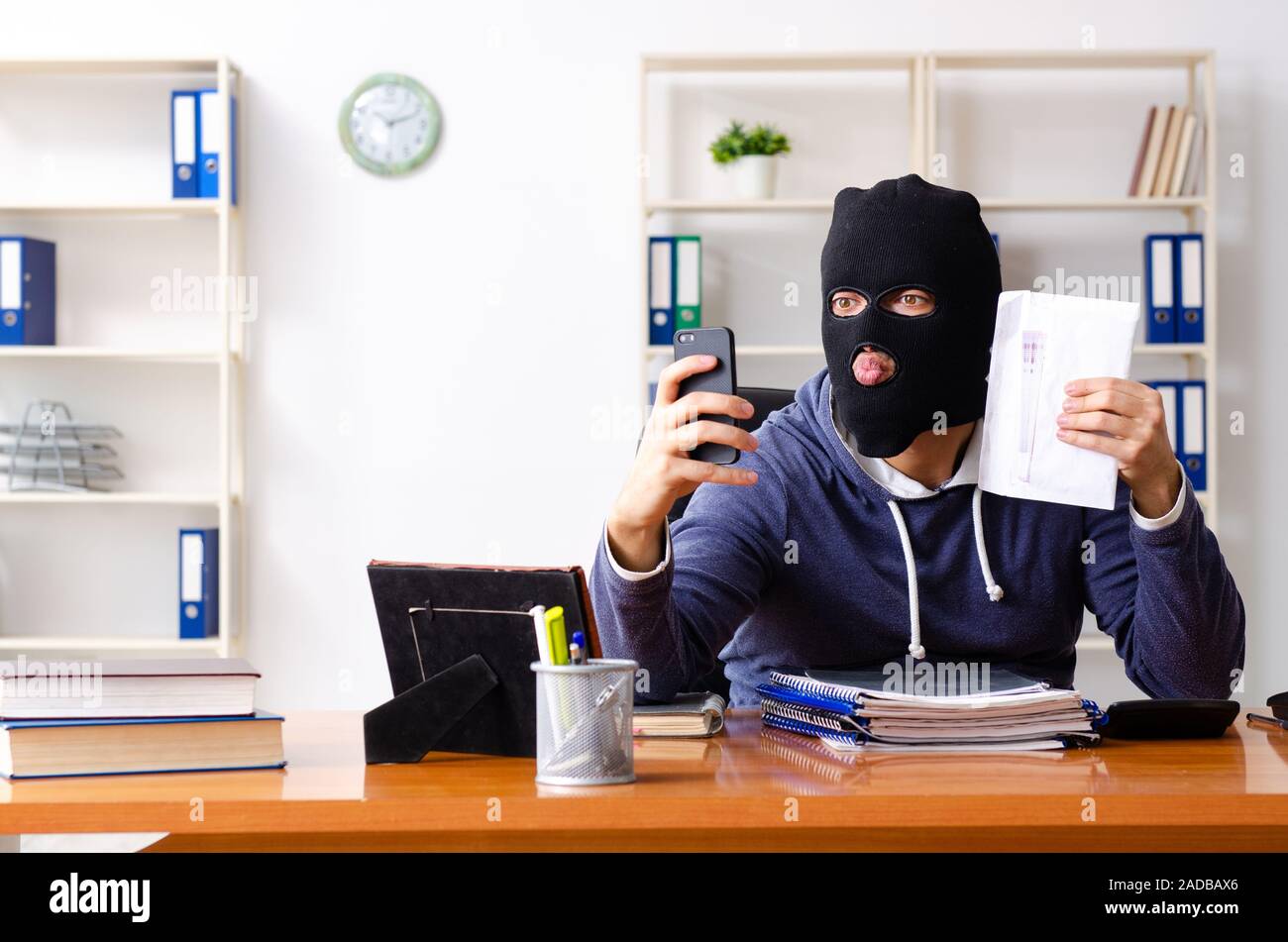 Male thief in balaclava hi-res stock photography and images - Alamy
