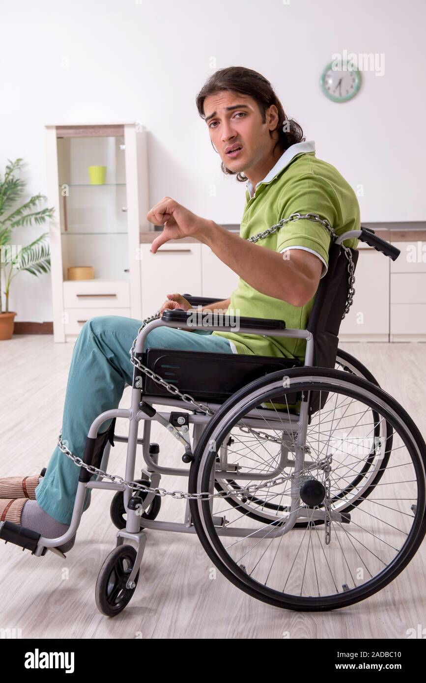 Man tied down chair hi-res stock photography and images - Alamy