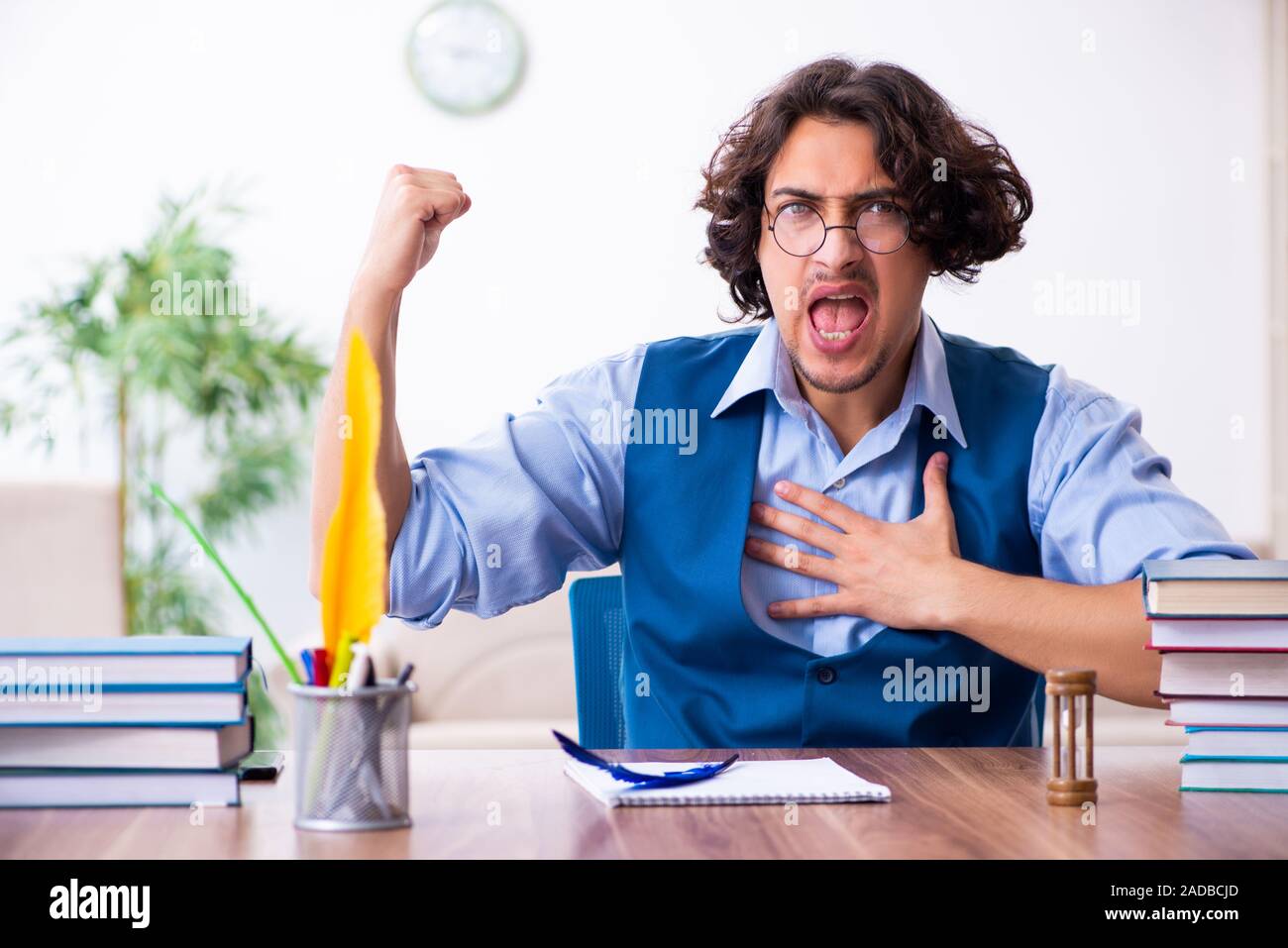 Young writer working on his new work Stock Photo - Alamy