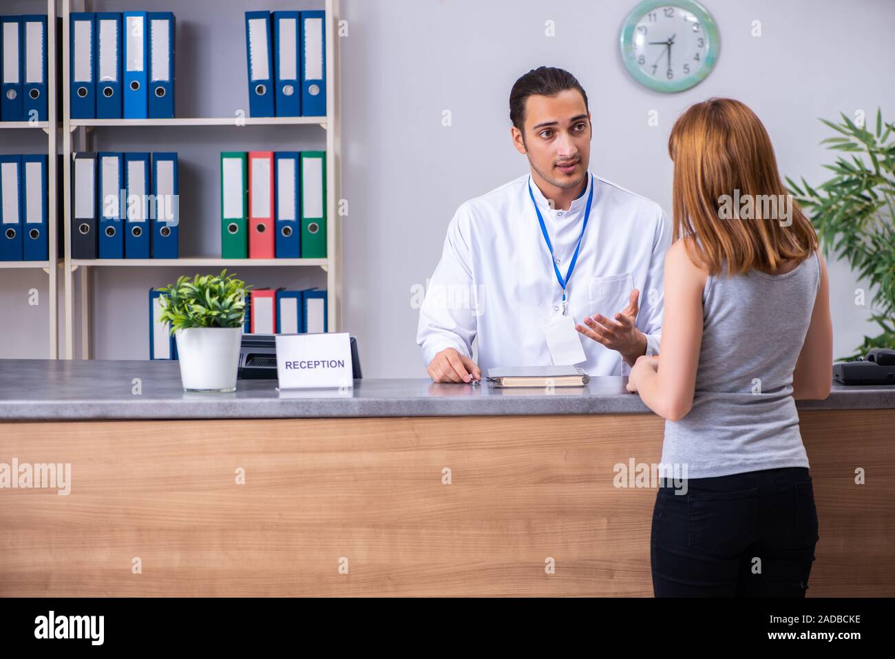Young patient at the reception in the hospital Stock Photo - Alamy