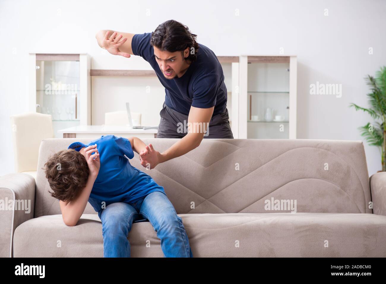 Concept of underage smoking with young boy and family Stock Photo - Alamy
