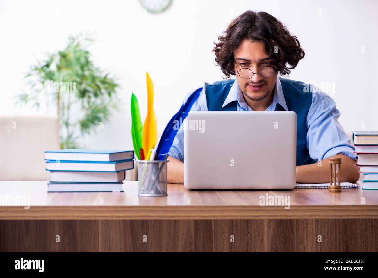 Young writer working on his new work Stock Photo - Alamy