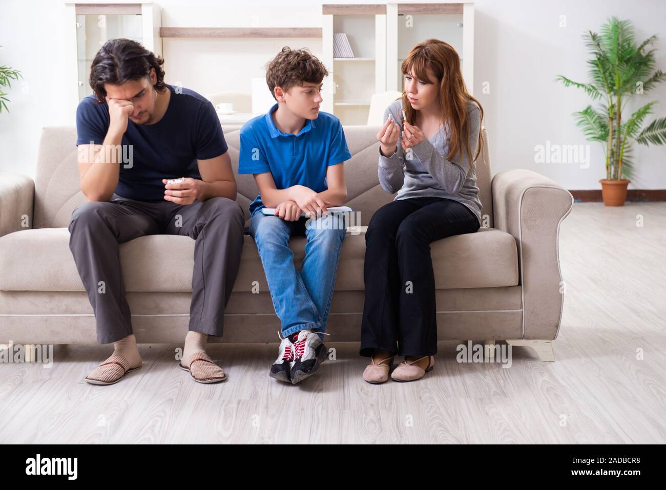 Concept of underage smoking with young boy and family Stock Photo - Alamy