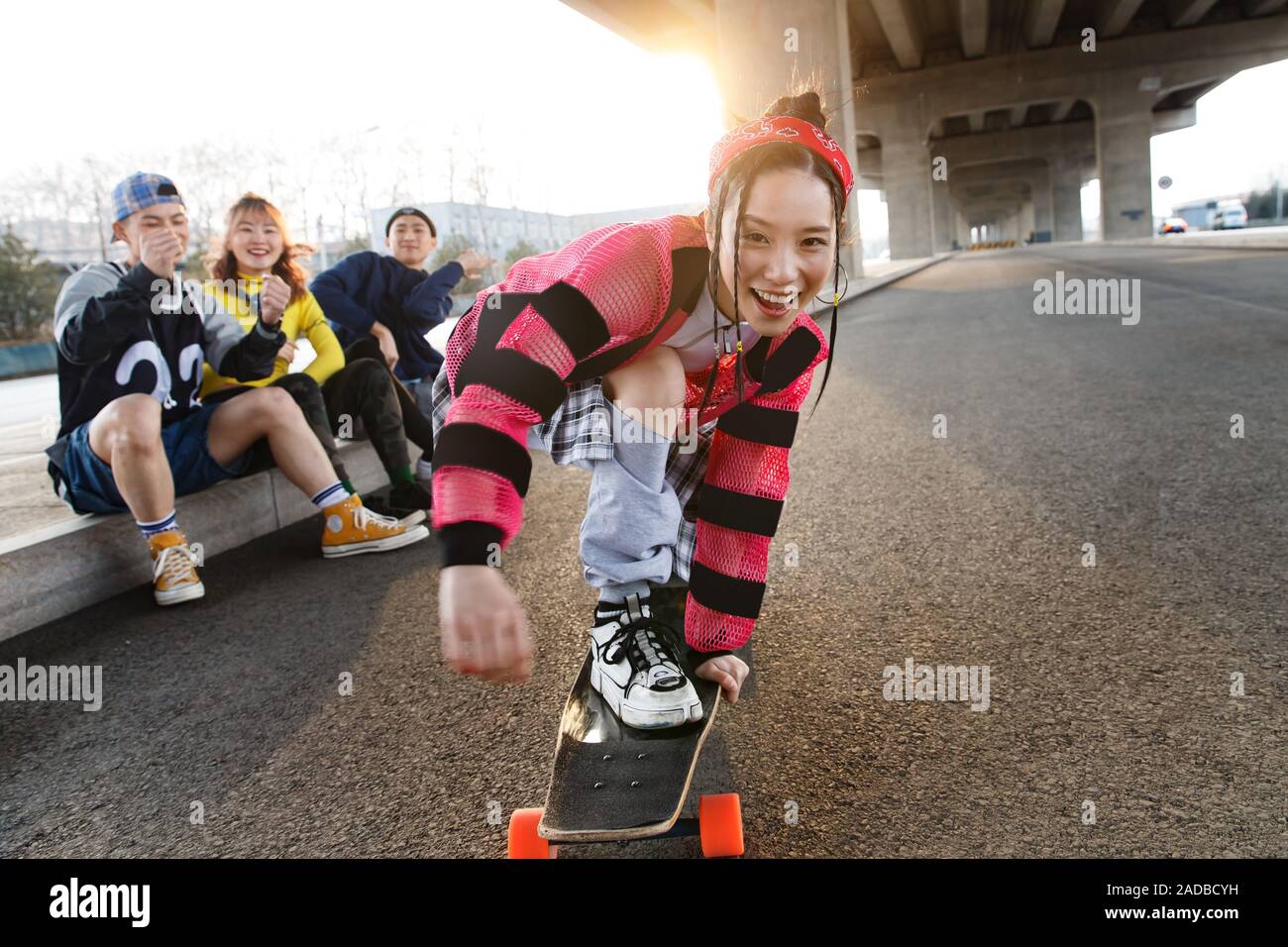 Young people skateboarding Stock Photo - Alamy