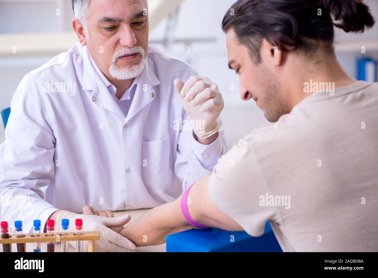 Blood transfusion giving during hi-res stock photography and images - Alamy