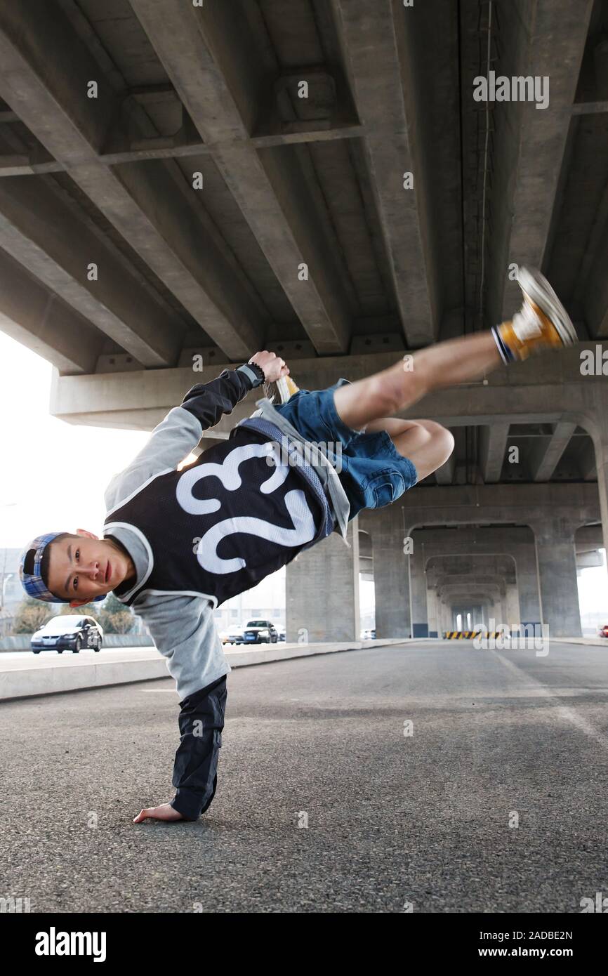 Young people jump street dance Stock Photo - Alamy