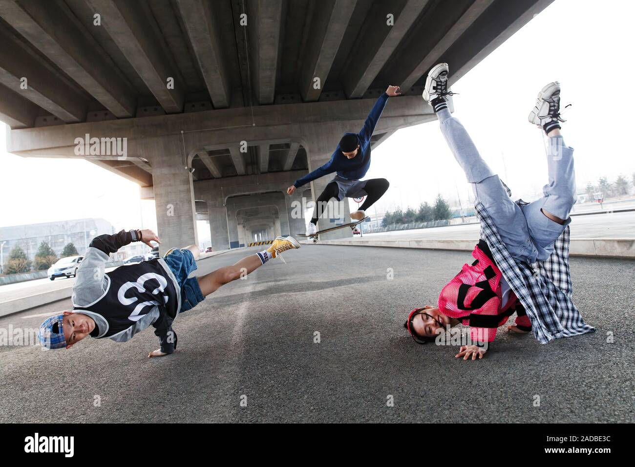 Young people jump street dance Stock Photo - Alamy