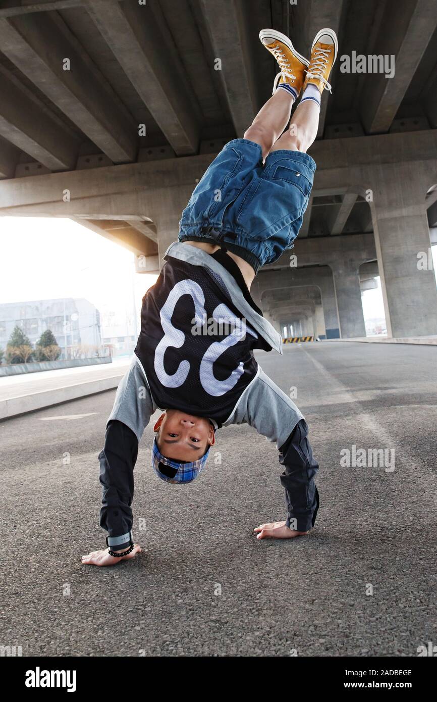Young people jump street dance Stock Photo - Alamy