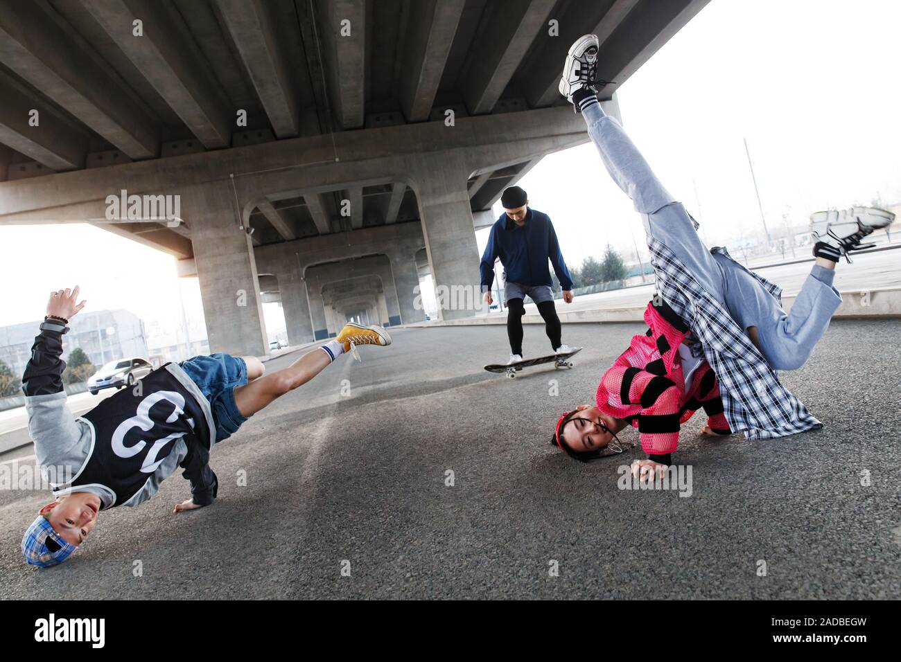 Young people jump street dance Stock Photo - Alamy