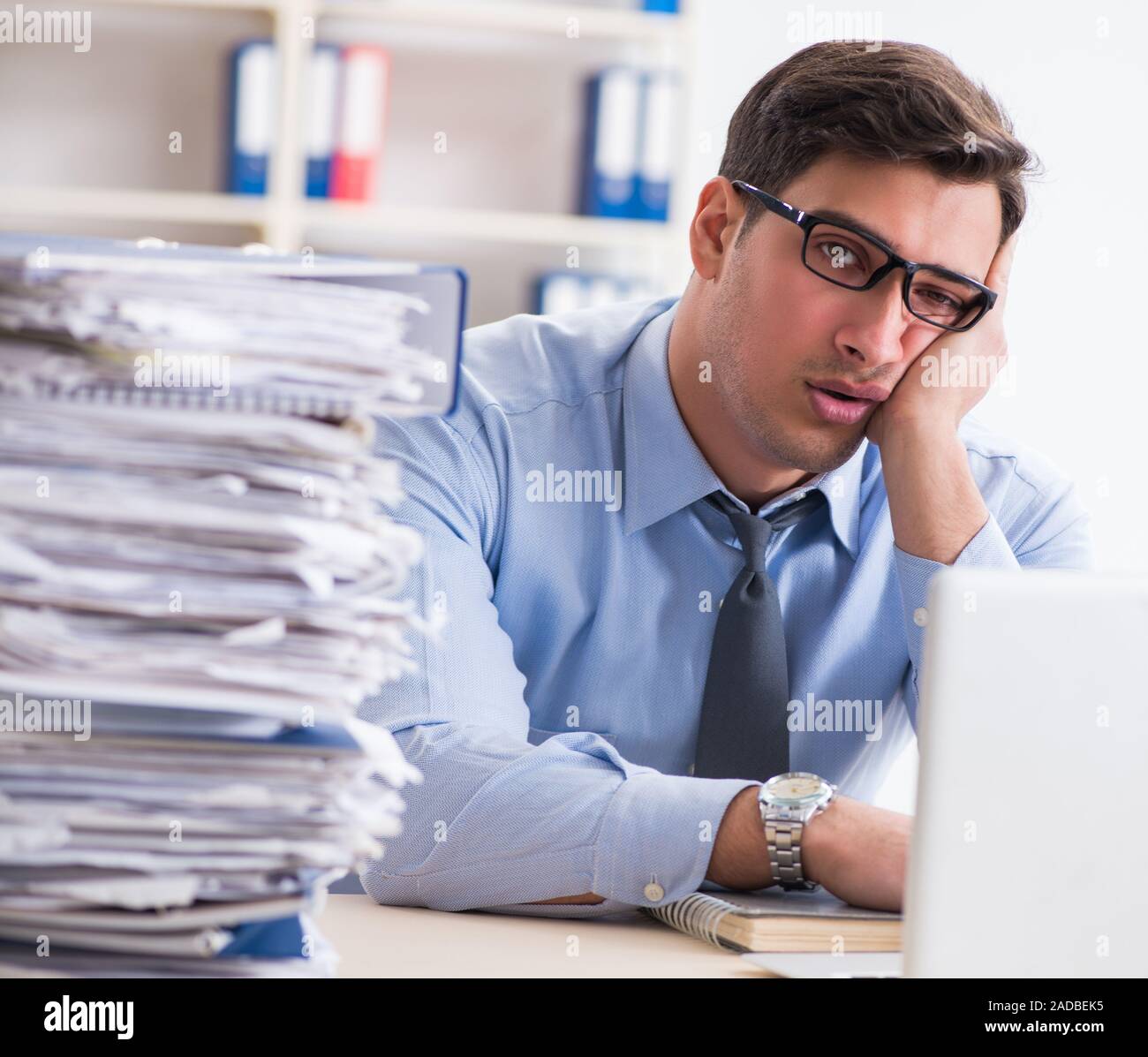 Extremely busy Businessman working in office Stock Photo - Alamy