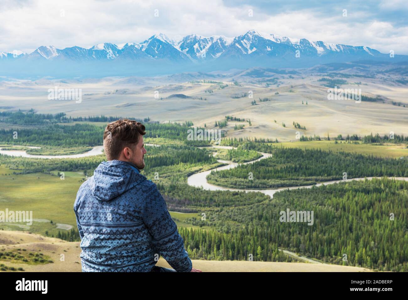 Relaxing man in Kurai steppe on North-Chui ridge Stock Photo - Alamy
