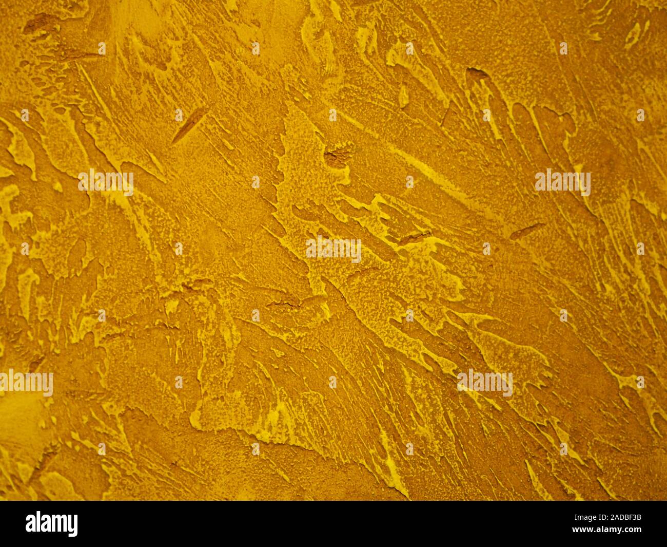 surface of the wall is rough, paint in gold texture material background ...
