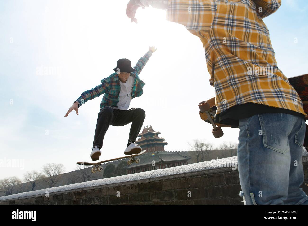 Young people skateboarding Stock Photo - Alamy