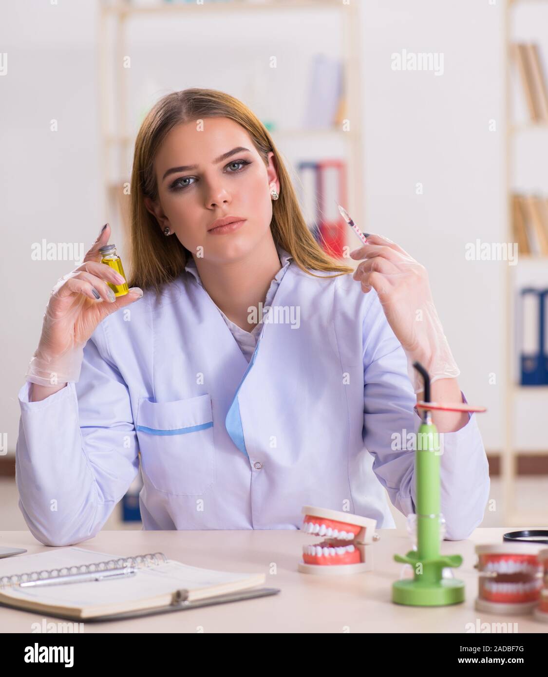 Dentistry student practicing skills in classroom Stock Photo - Alamy