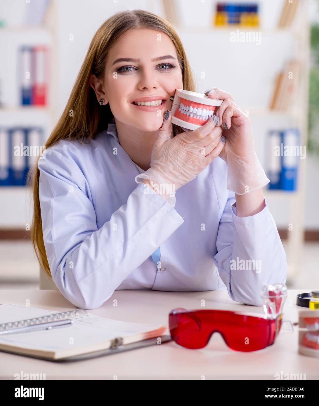 Dentistry student practicing skills in classroom Stock Photo - Alamy
