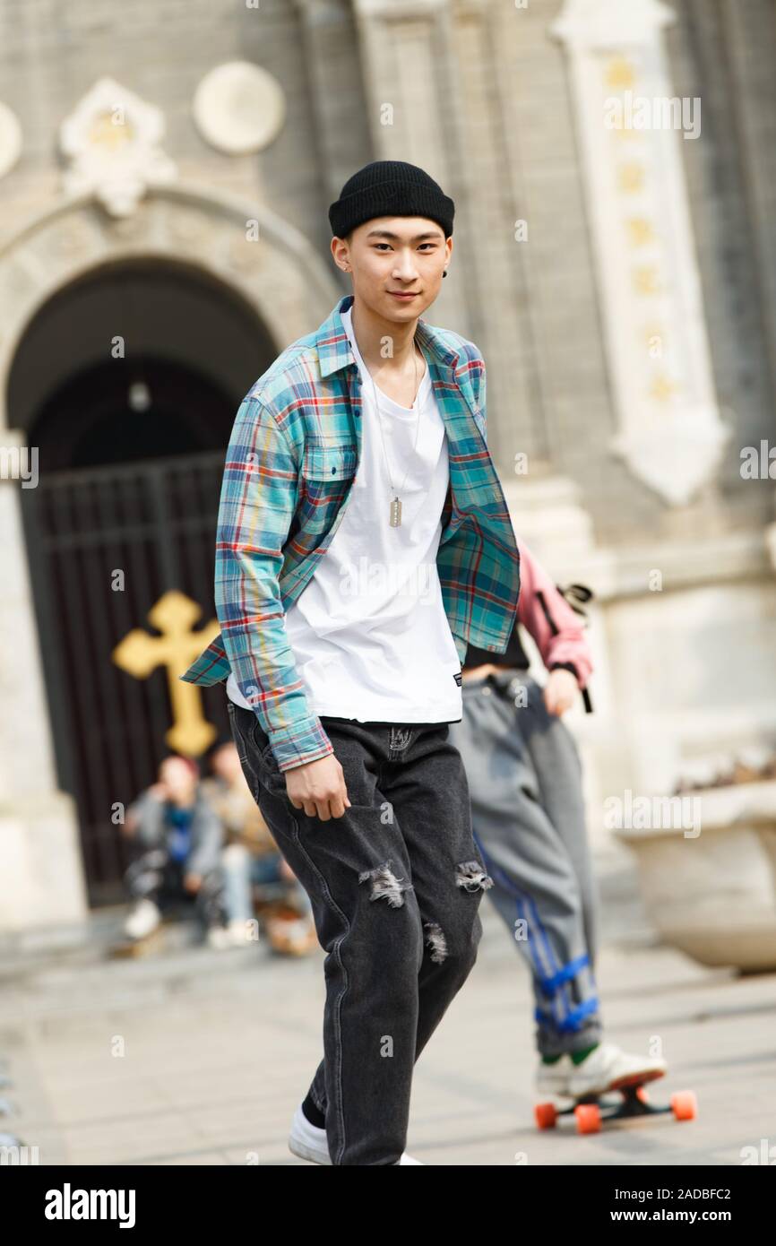 Young people skateboarding Stock Photo - Alamy