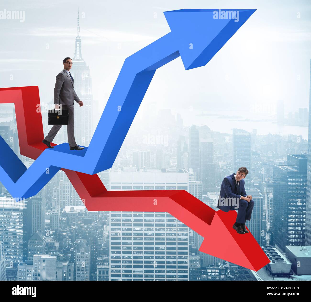 Businessman with charts of growth and decline Stock Photo - Alamy