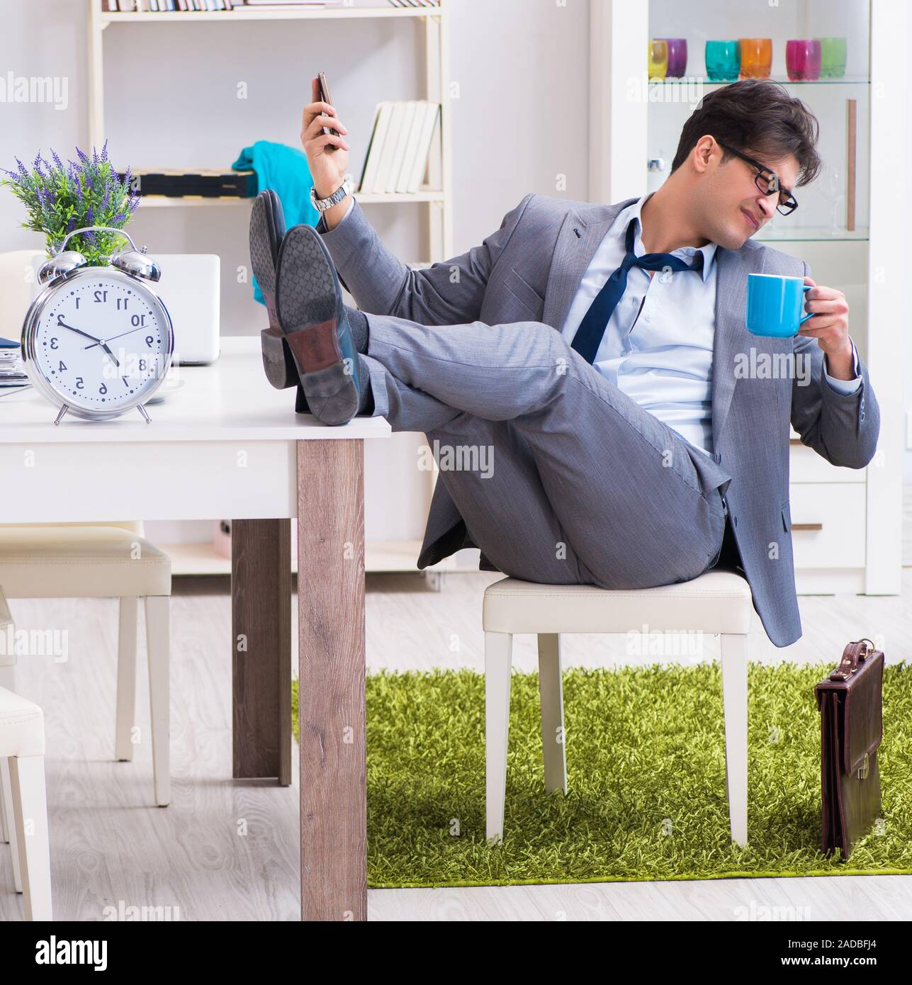 Businessman late for office due to oversleeping after overnight Stock ...