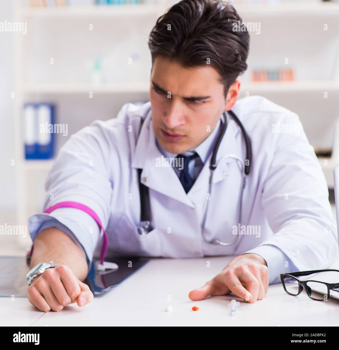 Doctor drug addict in the hospital Stock Photo - Alamy