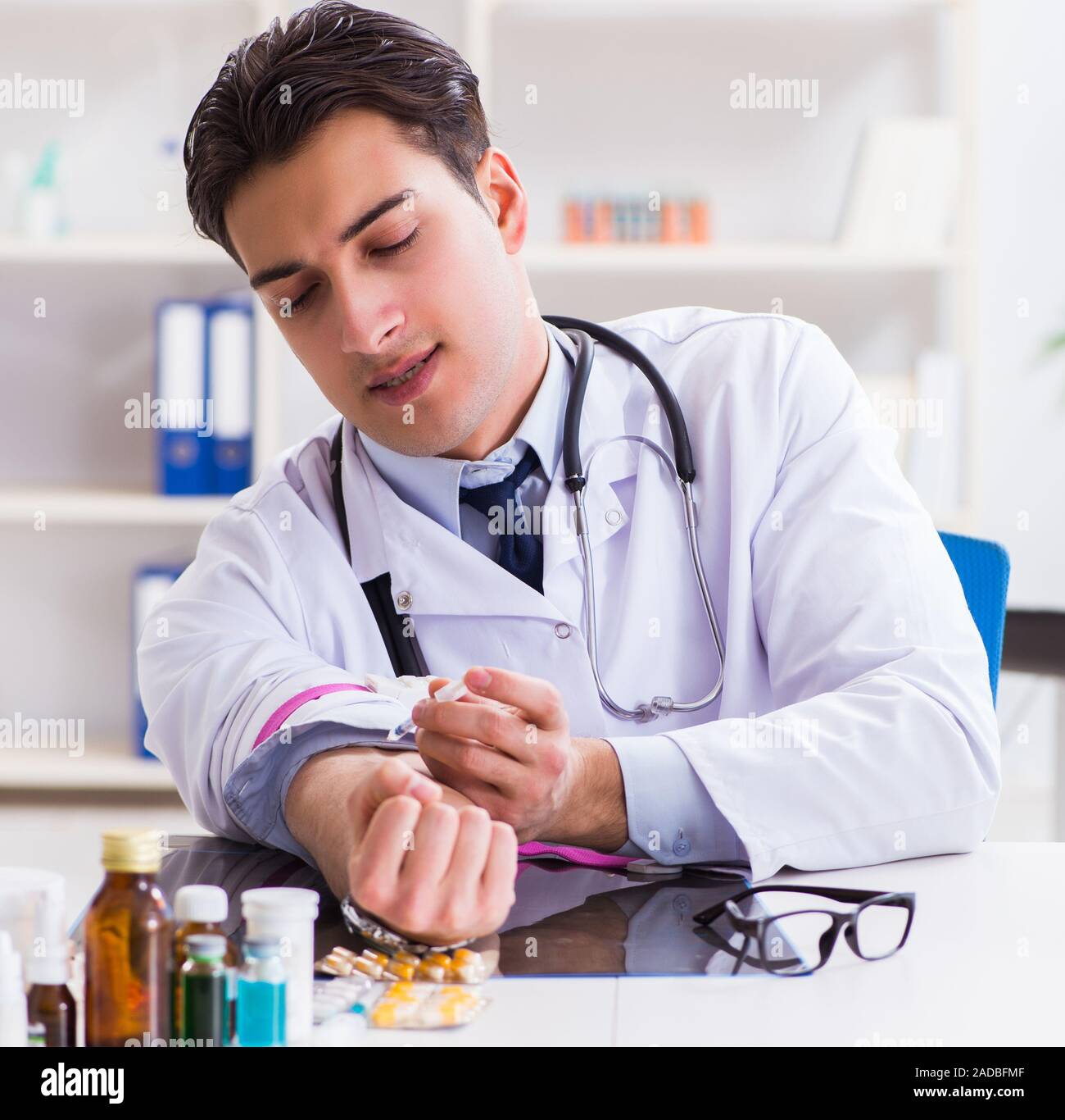 Doctor drug addict in the hospital Stock Photo - Alamy