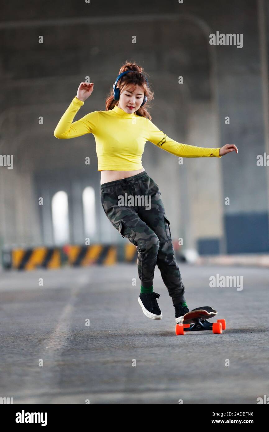 Young people skateboarding Stock Photo - Alamy