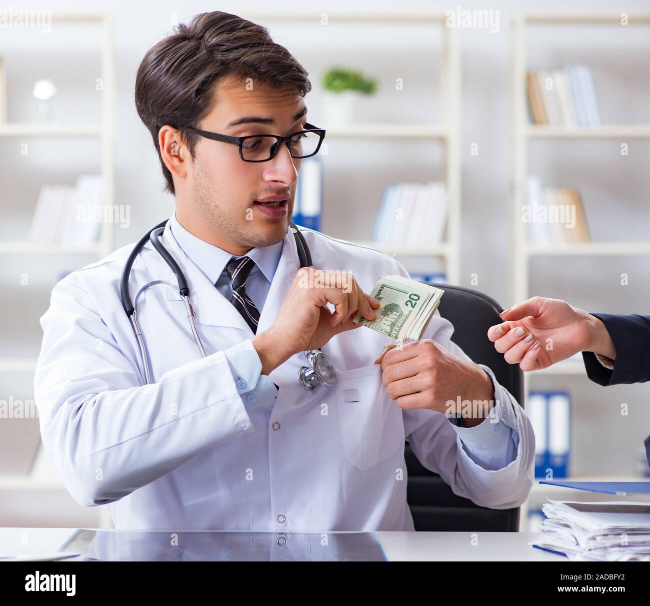 Doctor money envelope hi-res stock photography and images - Alamy